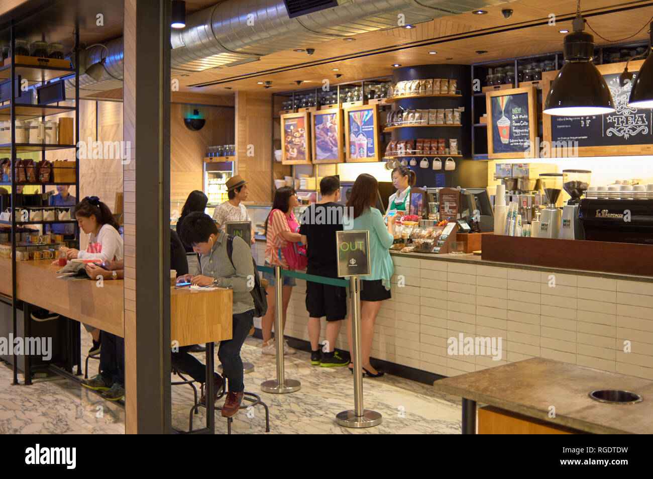 HONG KONG - MAY 05, 2015: Starbucks coffee shop at IFC mall. Starbucks ...