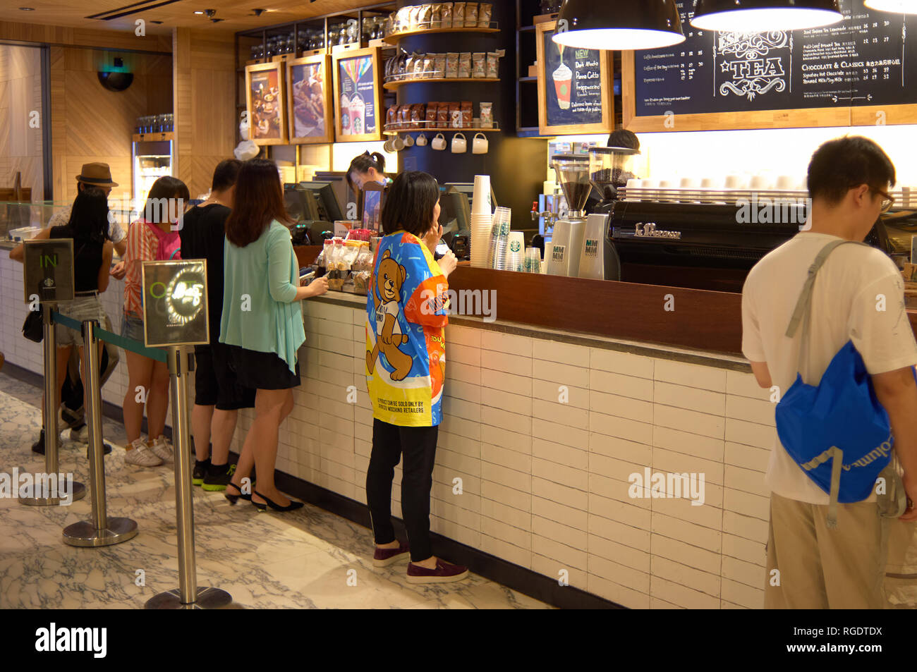 HONG KONG - MAY 05, 2015: Starbucks coffee shop at IFC mall. Starbucks ...