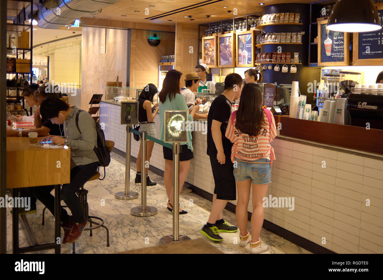 HONG KONG - MAY 05, 2015: Starbucks coffee shop at IFC mall. Starbucks ...