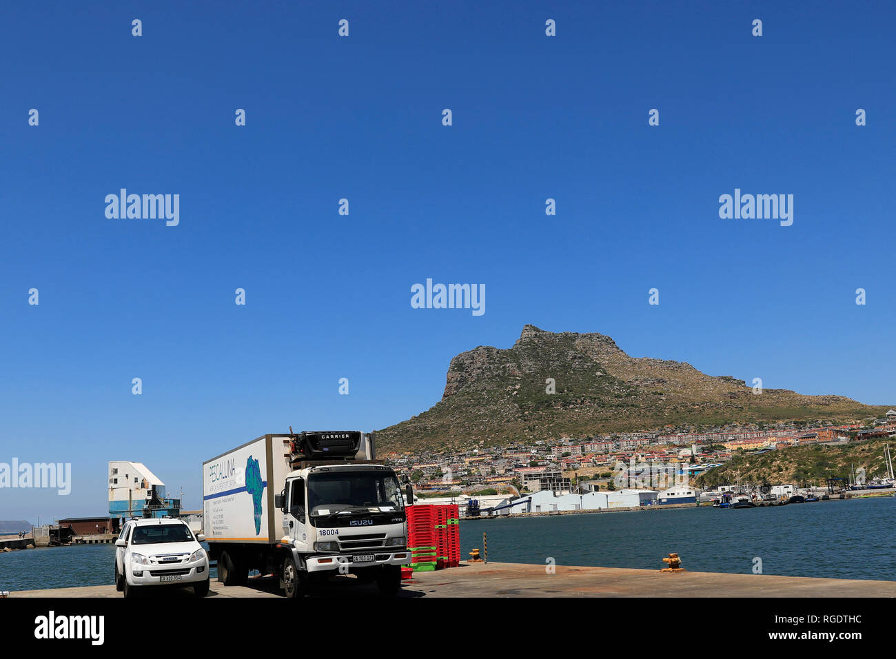 A Pescaluna Fisheries truck loading fish at the Hout Bay harbour in ...
