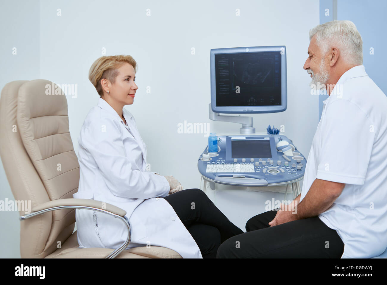 Portrait of two people in hispital on medical observation. Elderly man ...