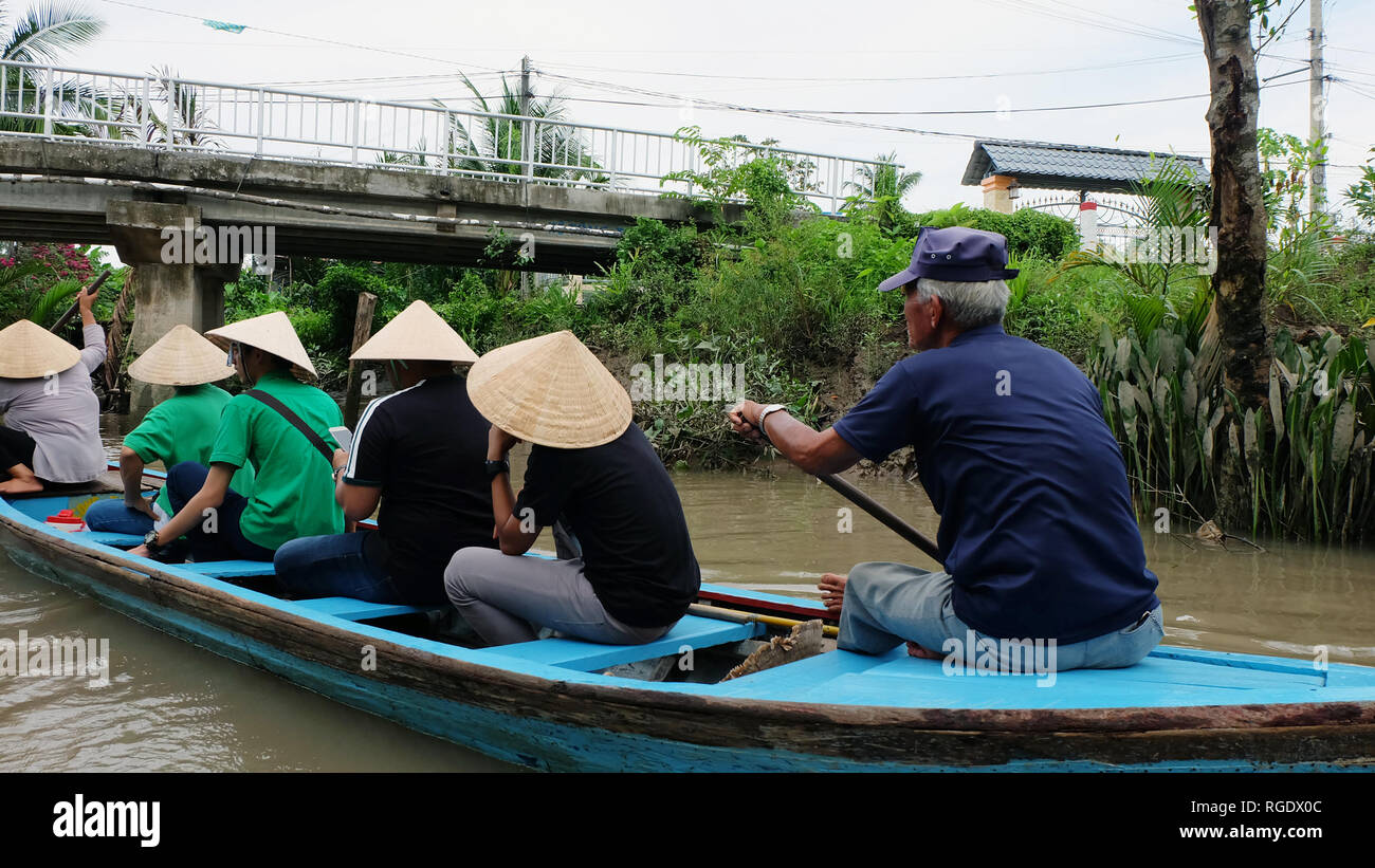 Old man rowing boat hi-res stock photography and images - Alamy