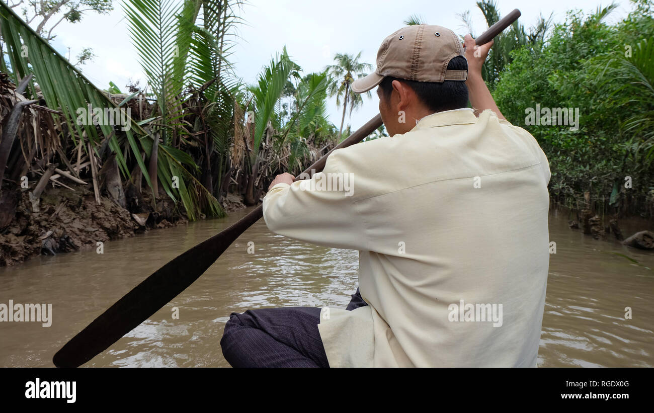 Back of man rowing boat hi-res stock photography and images - Alamy