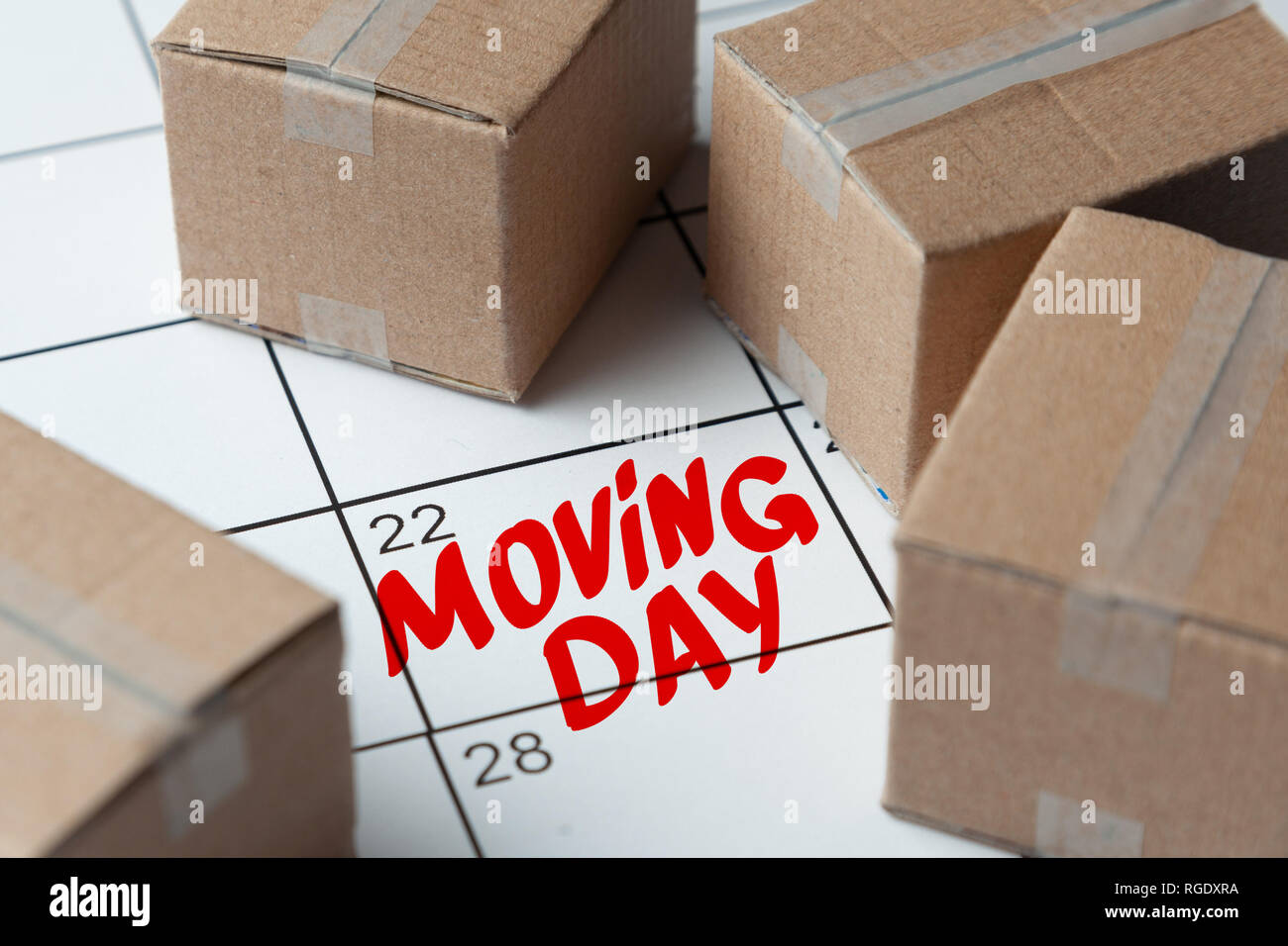 Moving day on the calendar is written in red. Calendar with a note with ...