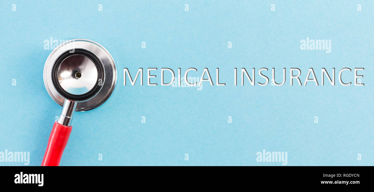 Stethoscope with medical insurance text with blue background as ...