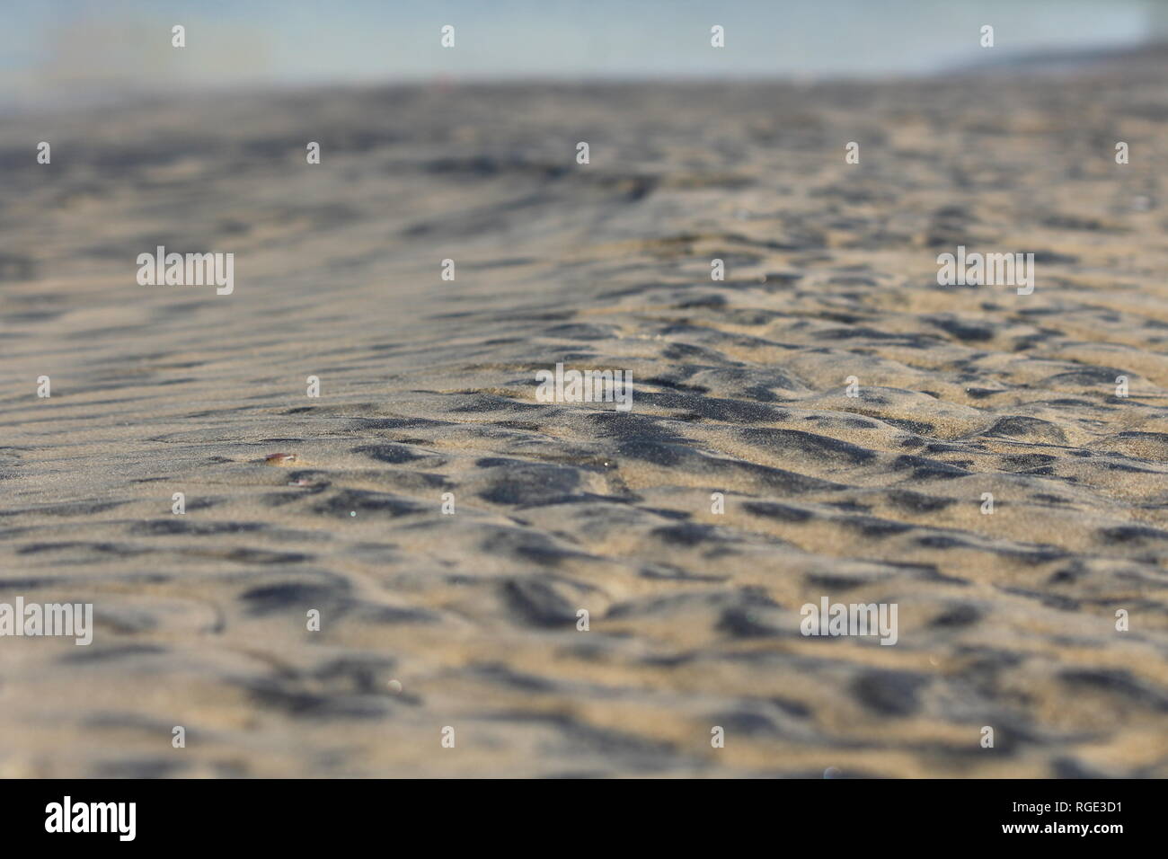 Sand on the seashore Stock Photo - Alamy