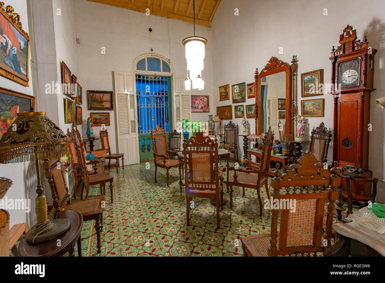 Room of a colonial house with antique wooden furniture and decorated ...