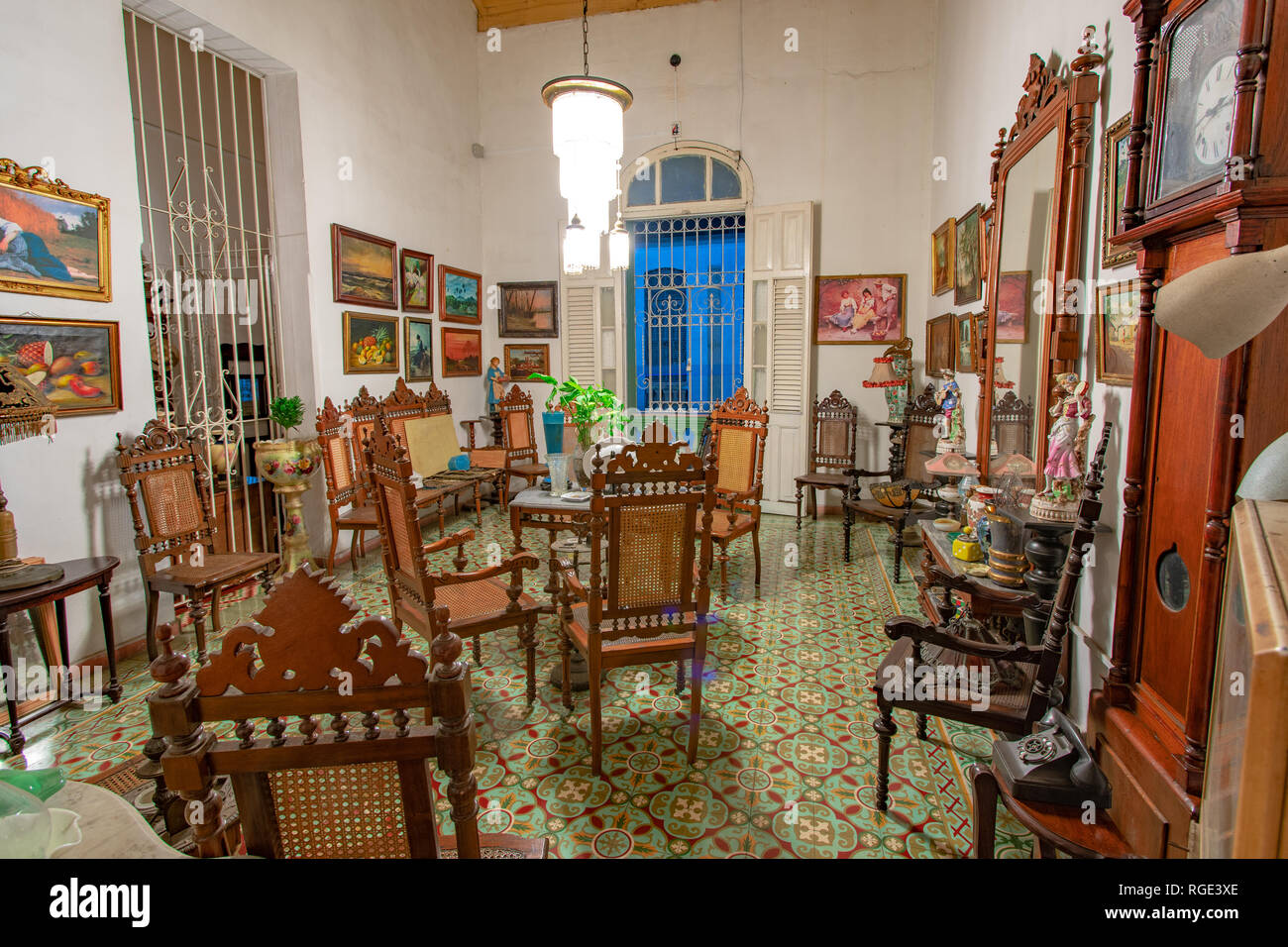 Room of a colonial house with antique wooden furniture and decorated ...