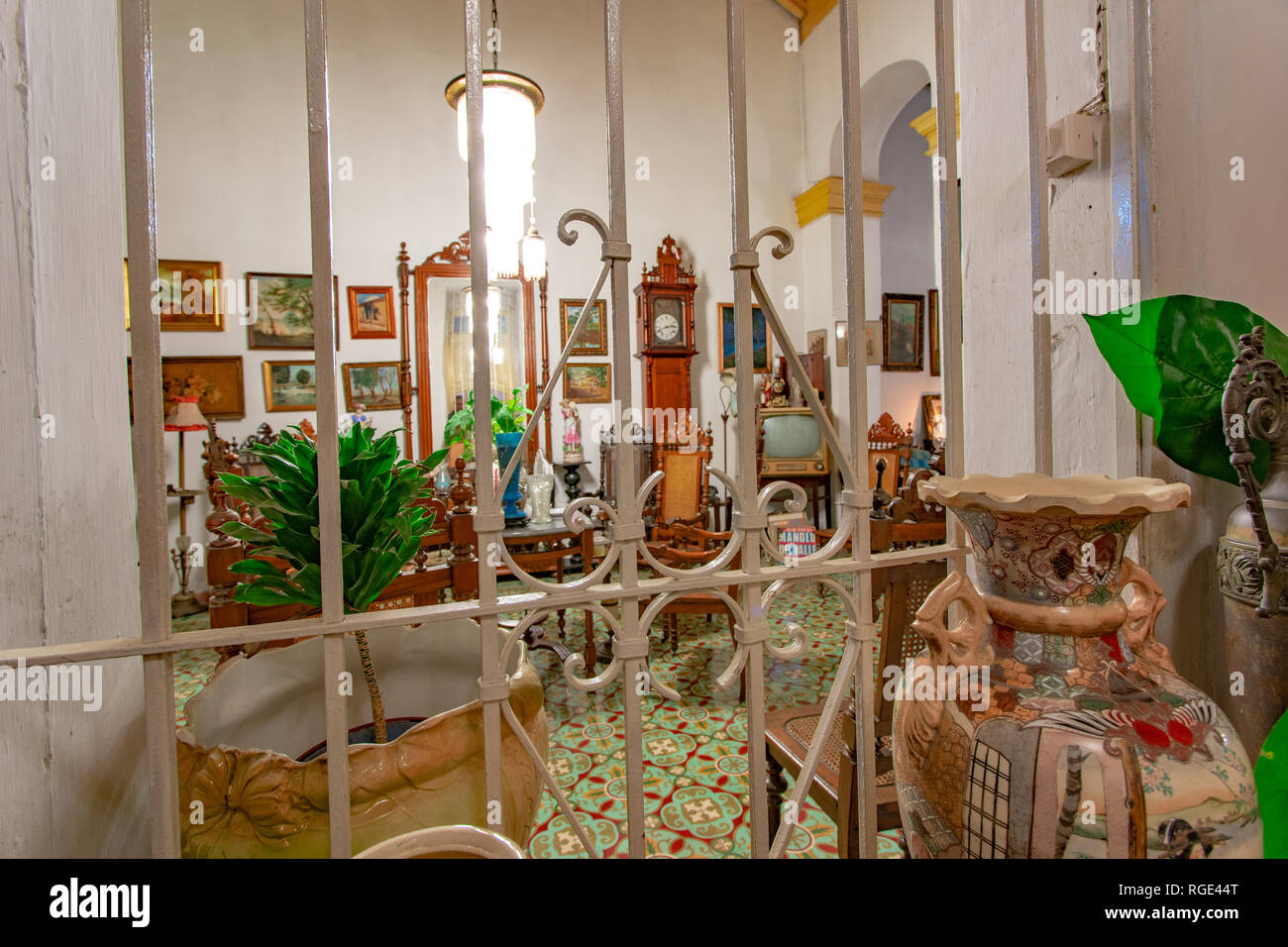 Room of a colonial house with antique wooden furniture and decorated ...