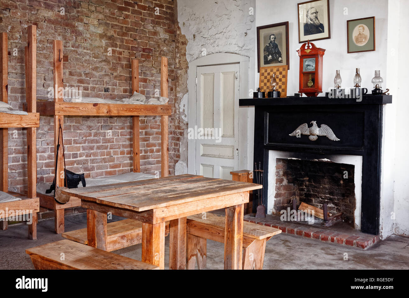officers quarters interior, bunk beds, fireplace, lanterns, table ...