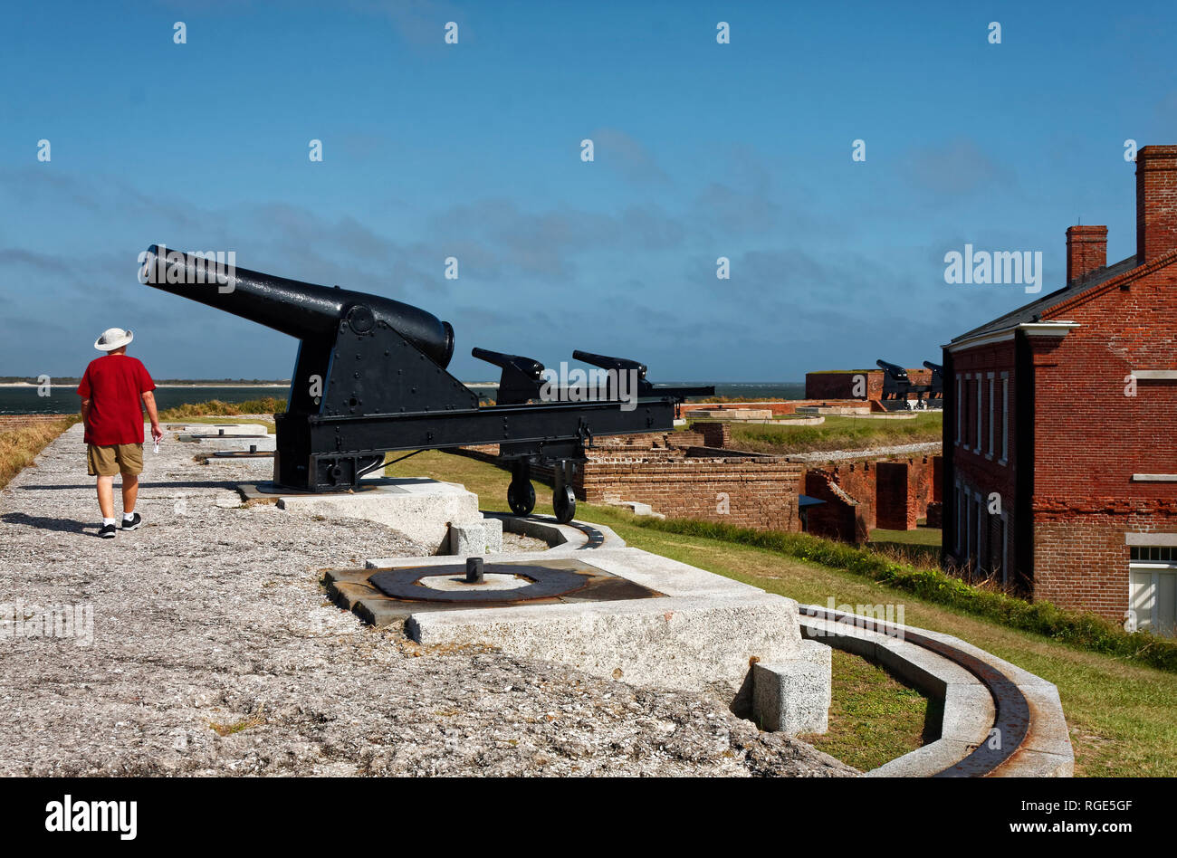 old fort, rampart, red brick buildings, canons, man, water beyond, 1847 ...