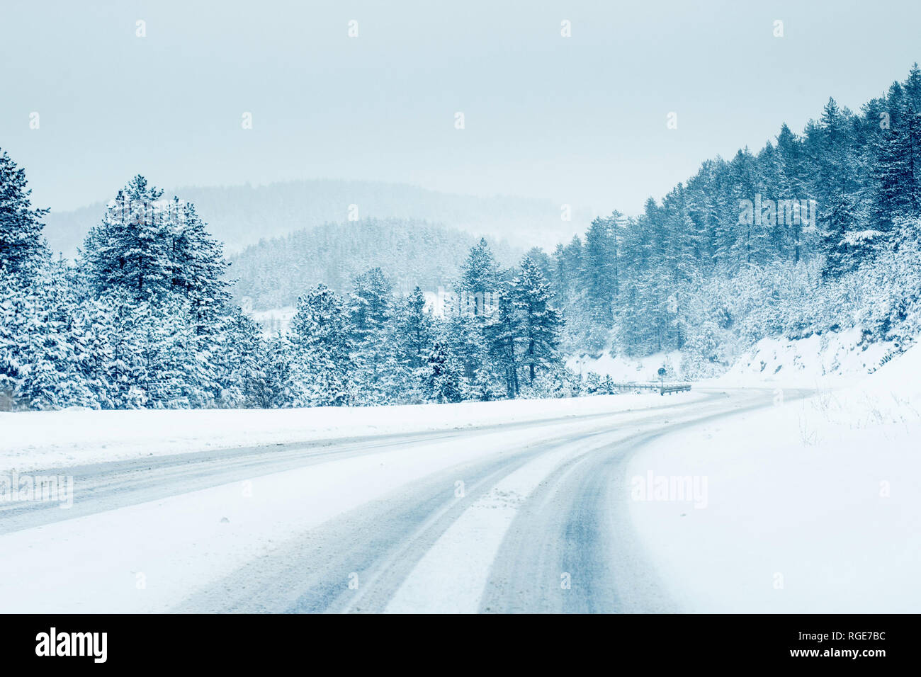 Mountain road in winter covered hi-res stock photography and images - Alamy