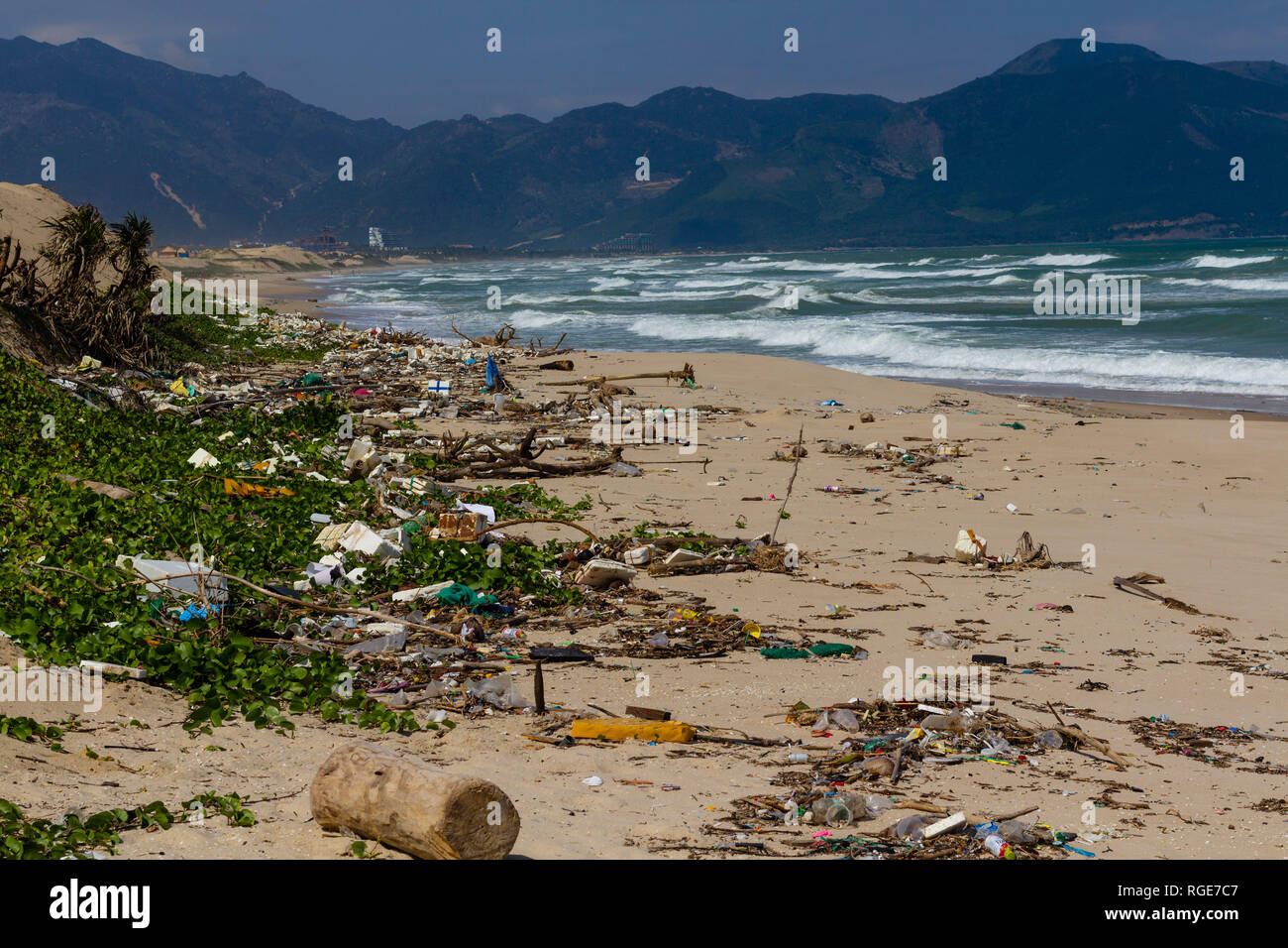 Beach pollution, plastic and waste from ocean on the beach Stock Photo ...