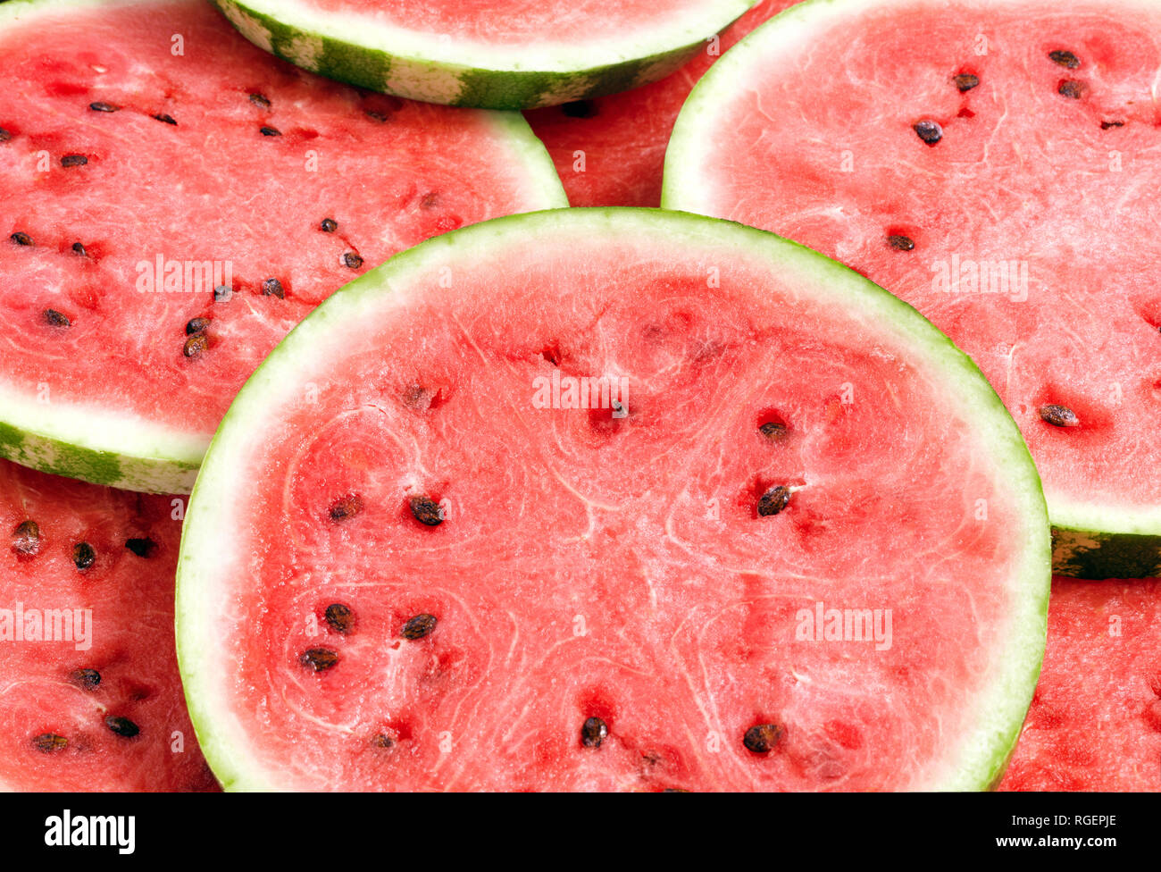 sliced watermelon as textured background Stock Photo - Alamy