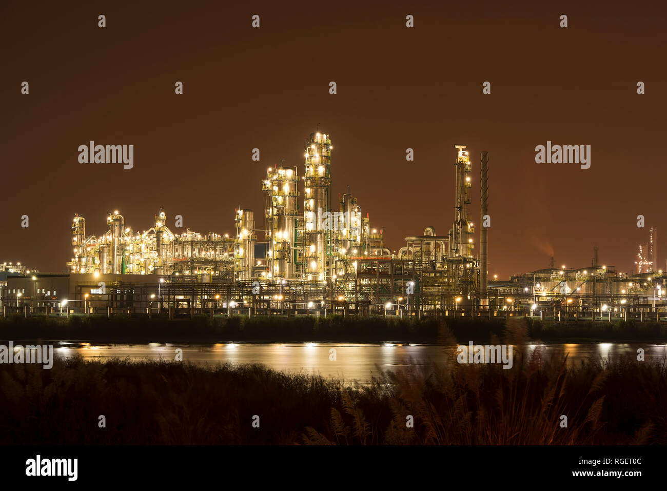 Refinery industrial plant with Industry boiler at night Stock Photo - Alamy