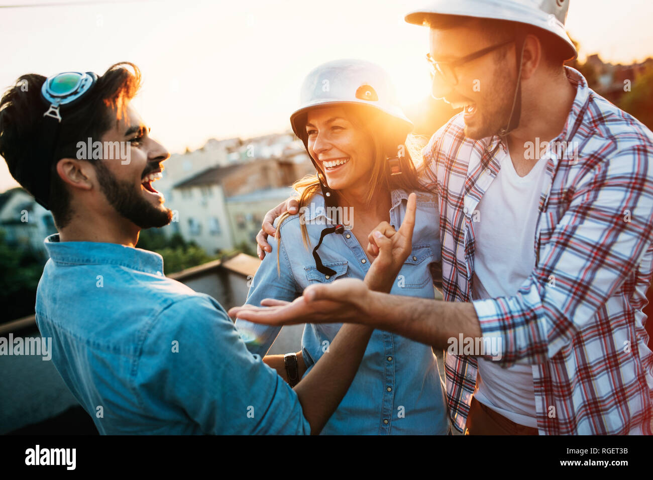Group of friends partying on terrace Stock Photo - Alamy