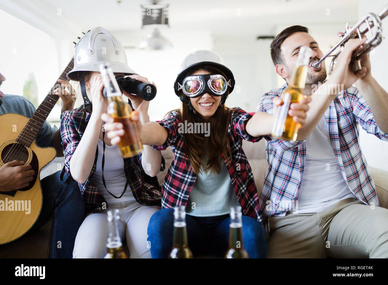 Happy cheerful friends spending fun times together Stock Photo - Alamy