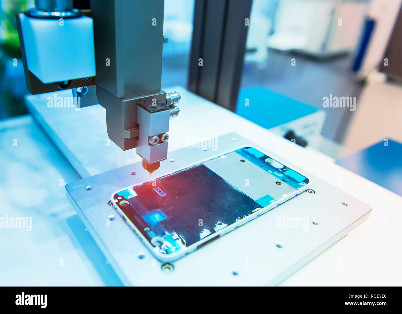 robotic machine measure the aluminum mobile phone part Stock Photo - Alamy