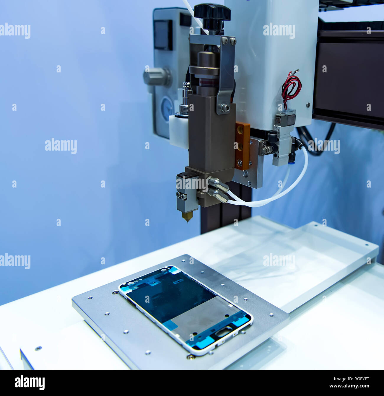 robotic machine measure the aluminum mobile phone part Stock Photo - Alamy