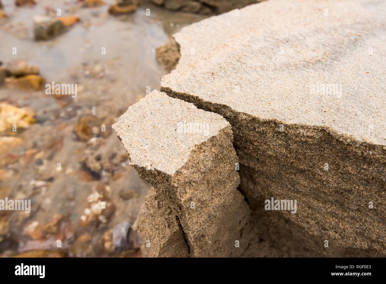 Close-up detail of rough cut miniature sand cliffs Stock Photo - Alamy