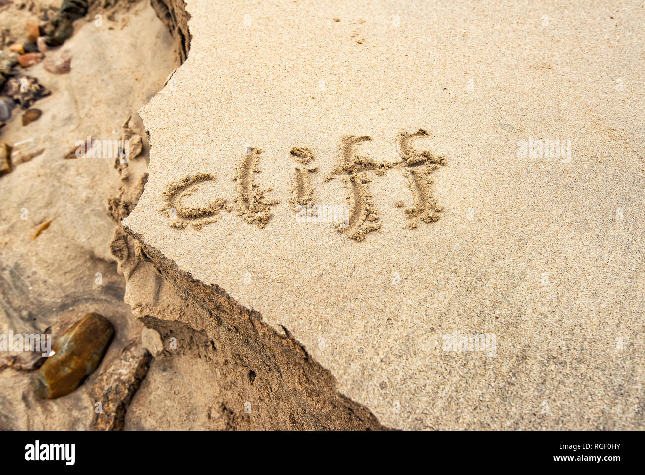cliff write in the sand Stock Photo - Alamy