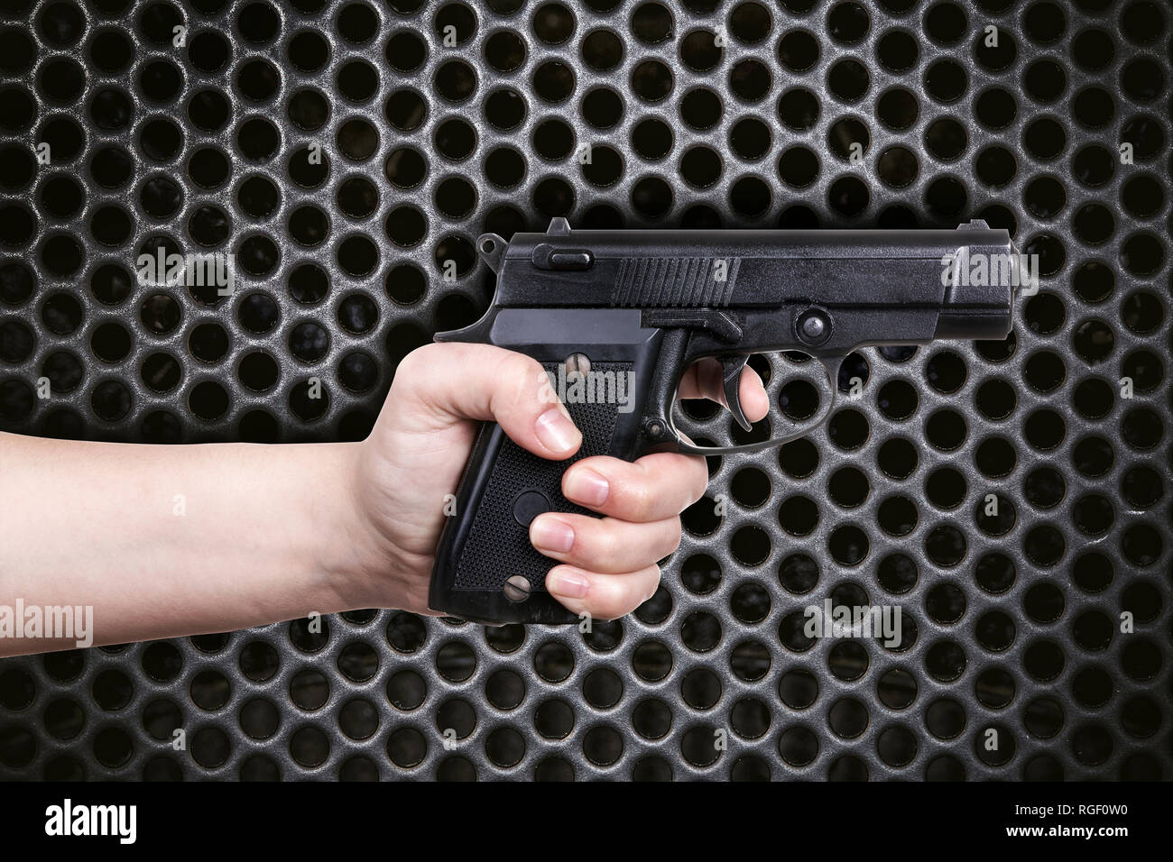 Hand holding gun hi-res stock photography and images - Alamy