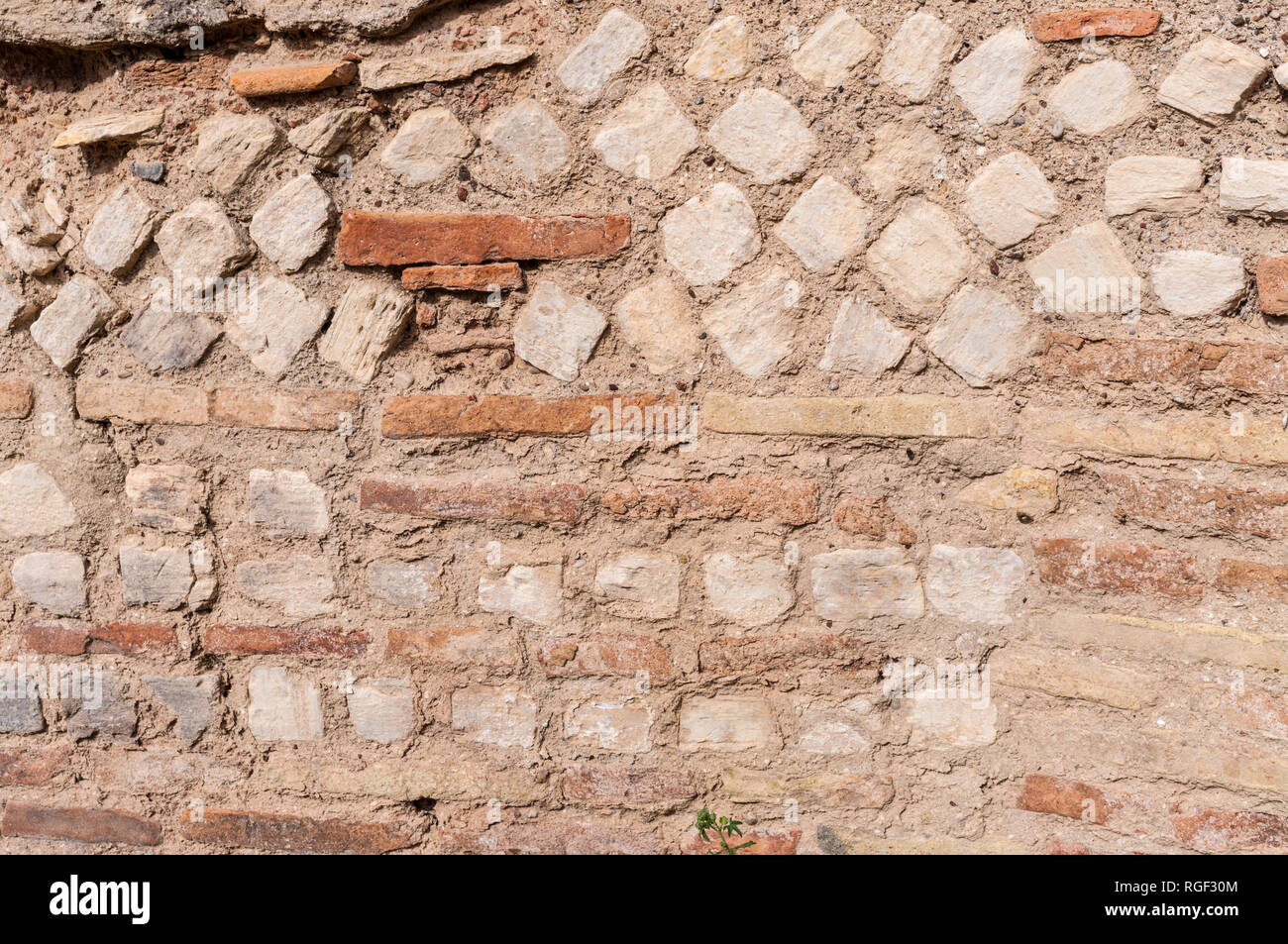 Detail of unusual ancient greek rock wall design and pattern near the ...