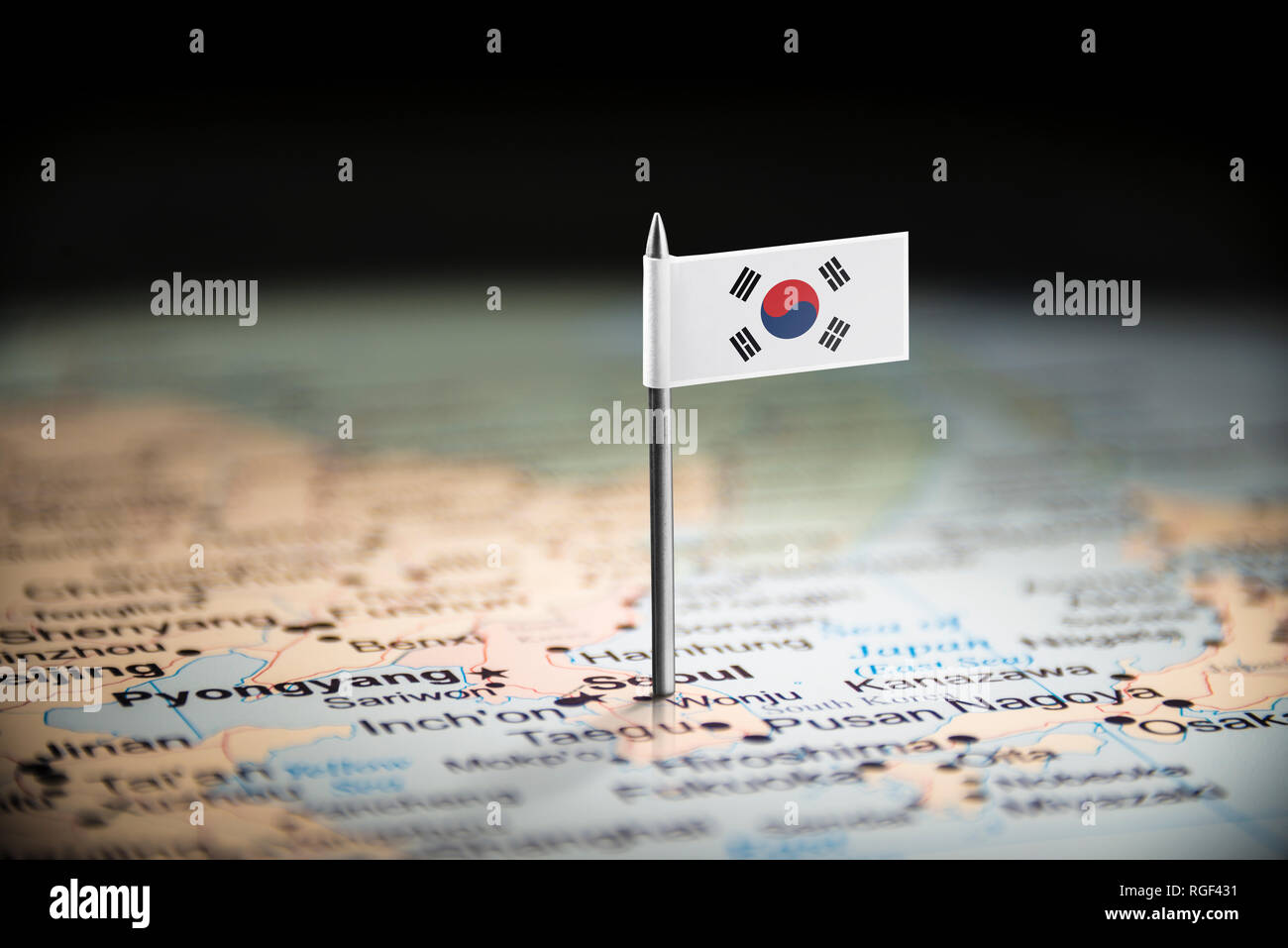 South Korean marked with a flag on the map Stock Photo - Alamy
