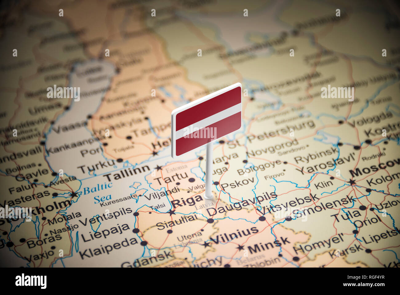 Latvia marked with a flag on the map Stock Photo - Alamy