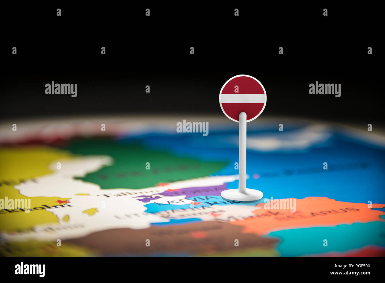 Latvia marked with a flag on the map Stock Photo - Alamy