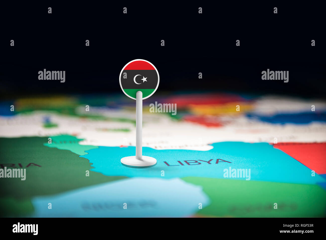 Libya marked with a flag on the map Stock Photo - Alamy