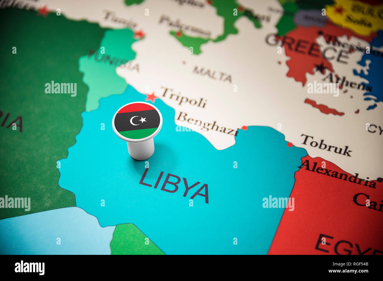 Libya marked with a flag on the map Stock Photo - Alamy