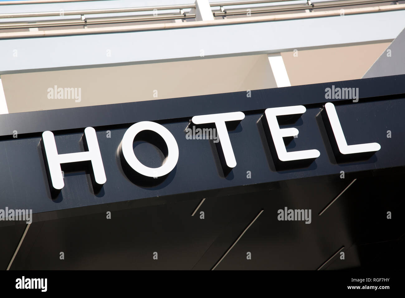 Hotel Sign on Building Facade on Diagonal Tilt Stock Photo - Alamy