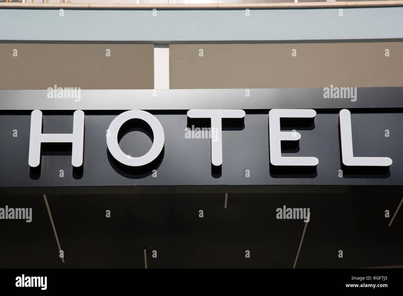 Hotel Sign on Building Facade Stock Photo - Alamy