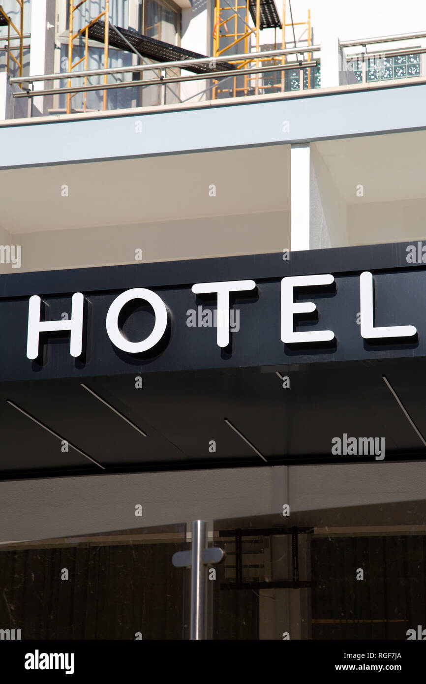 Hotel Sign on Building Facade Stock Photo - Alamy
