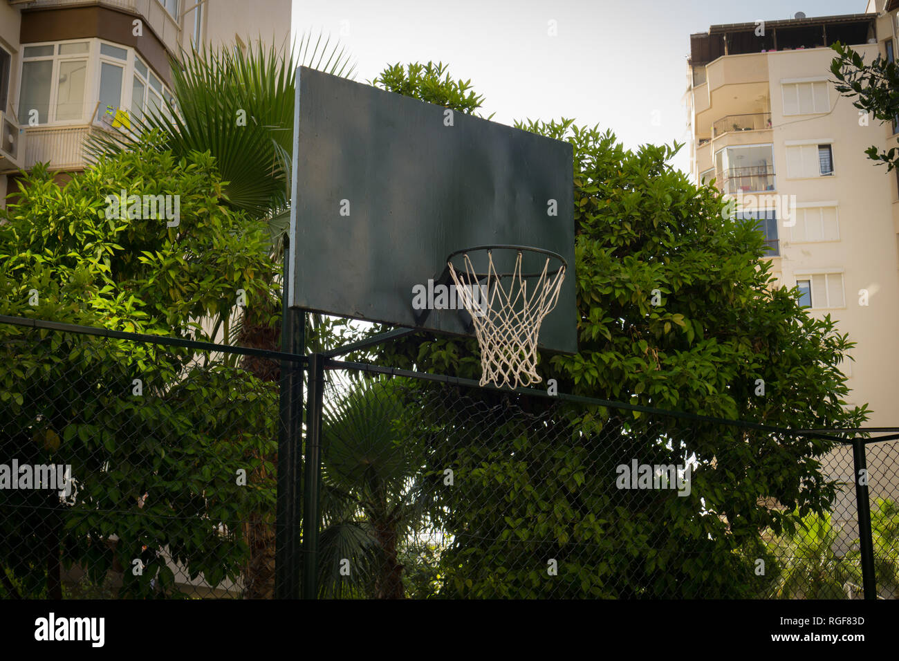 Basketball hoop in open air. View from the left side. Green metal Stock ...