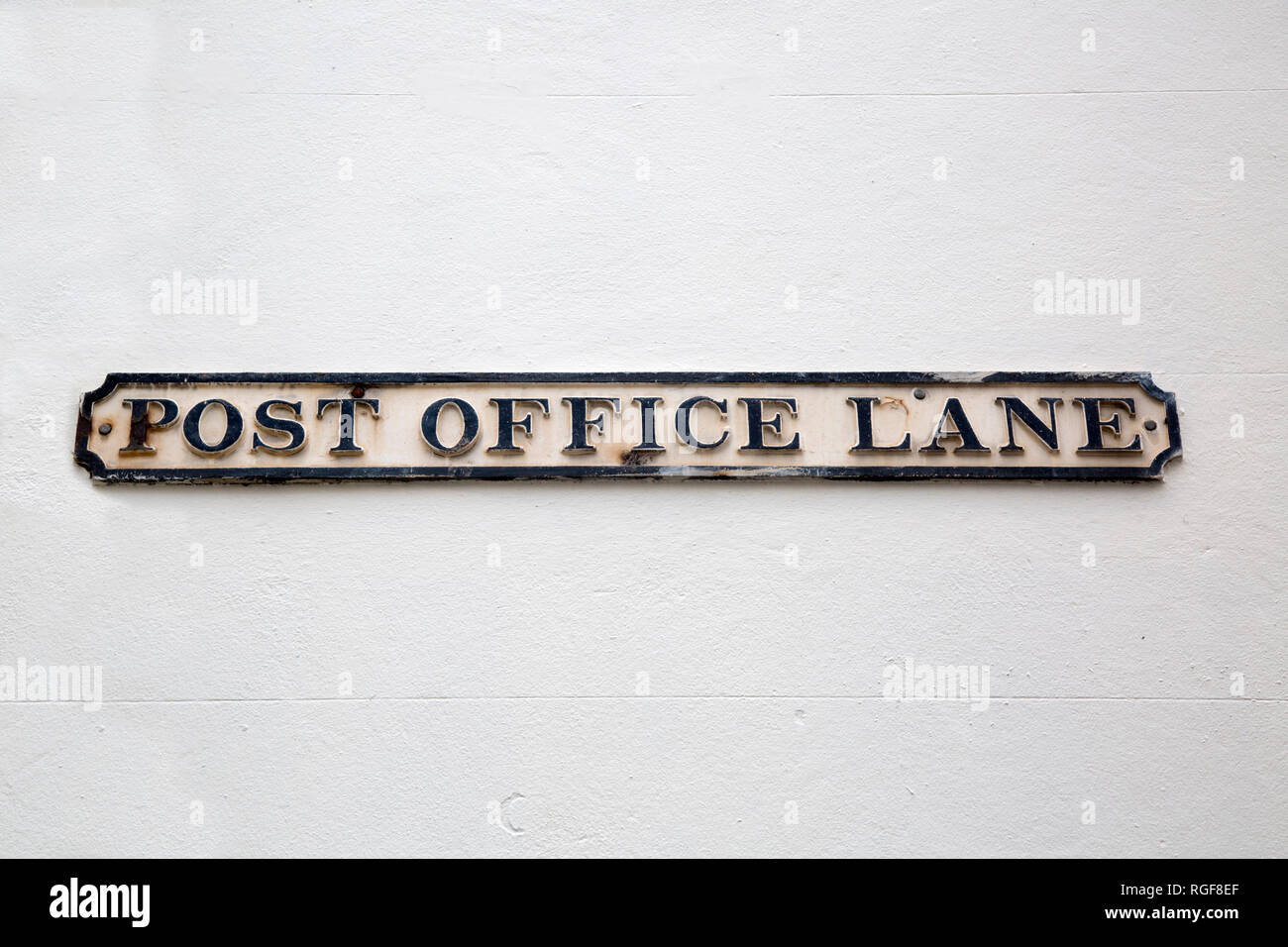 Post Office Street Sign on White Wall Stock Photo - Alamy