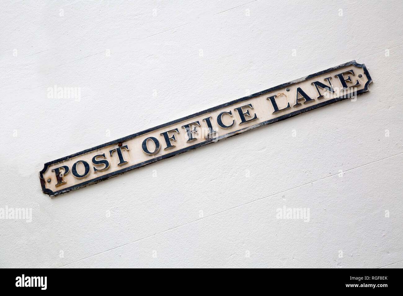 Post Office Street Sign on White Wall Stock Photo - Alamy