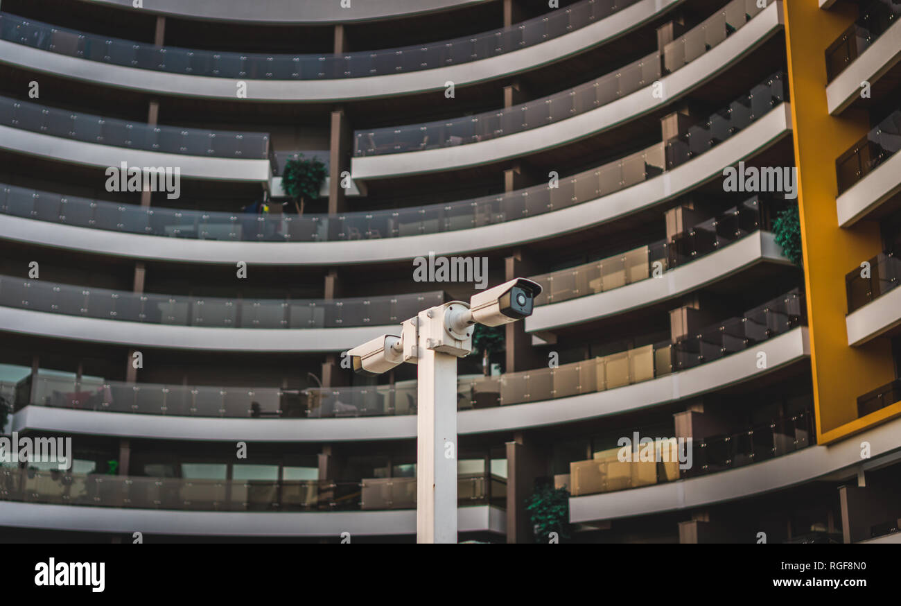 Security cameras in front of building in public area. Street security ...