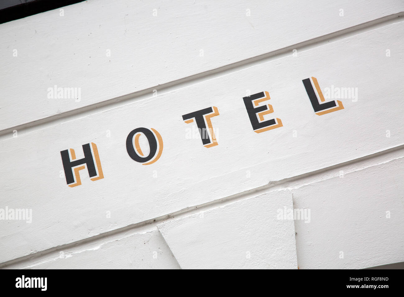 Hotel Sign on Building Facade Stock Photo - Alamy