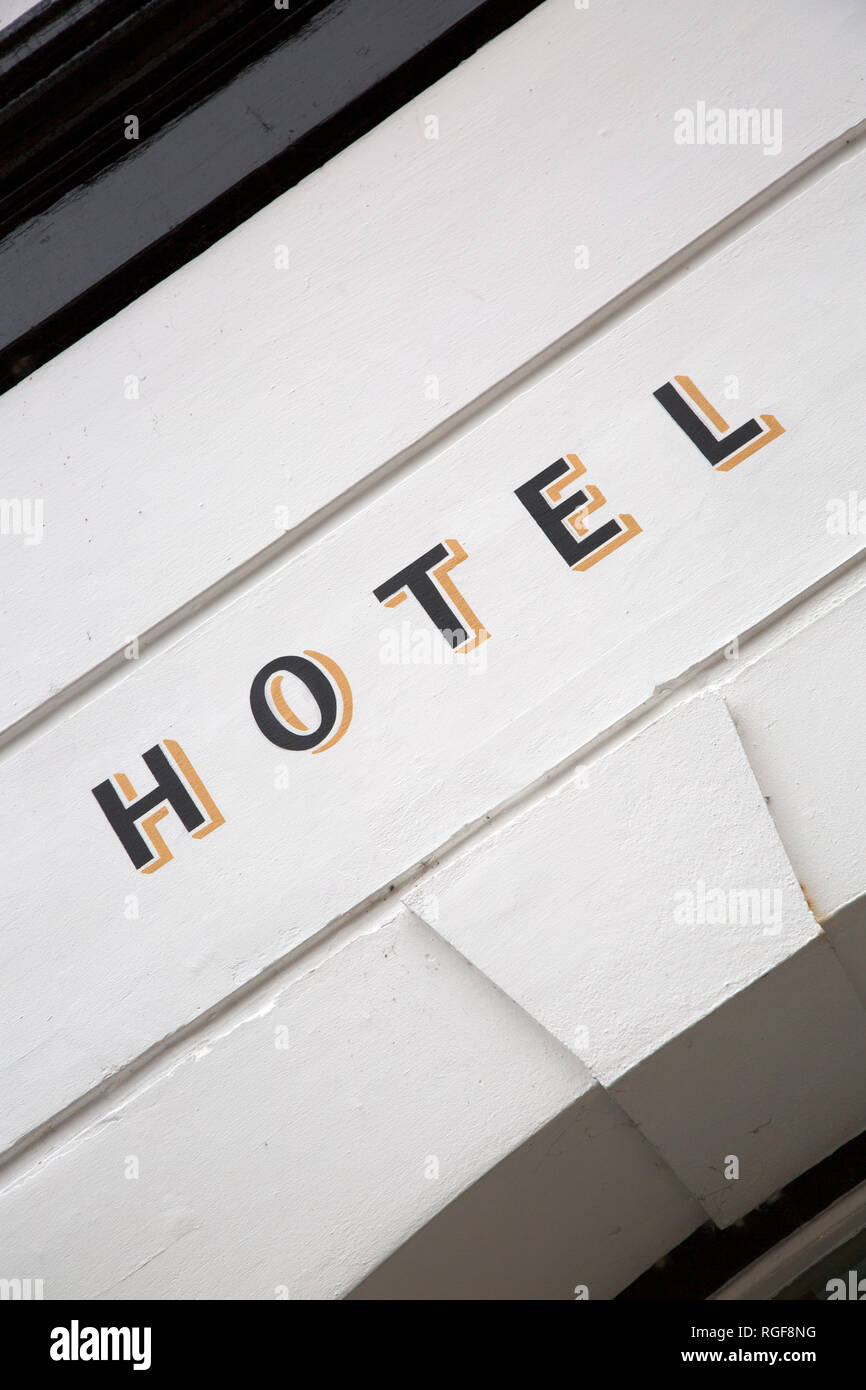 Hotel Sign on Building Facade Stock Photo - Alamy