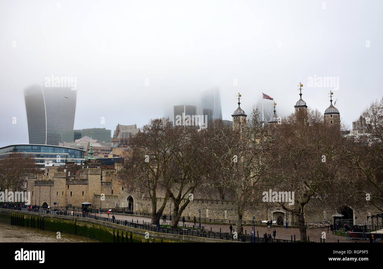 The Tower of London and The City with mist from Tower Bridge ...