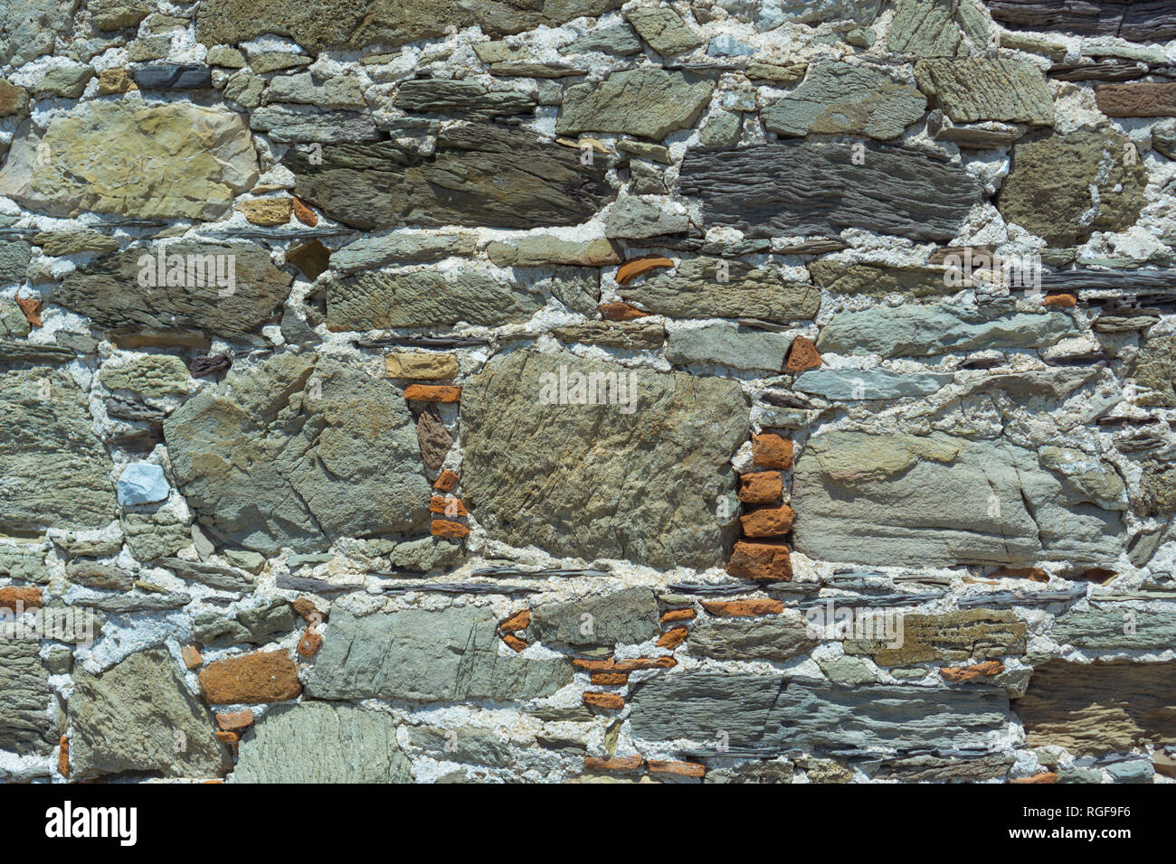 Stone wall pattern. Photo of all stone wall made from different stone ...