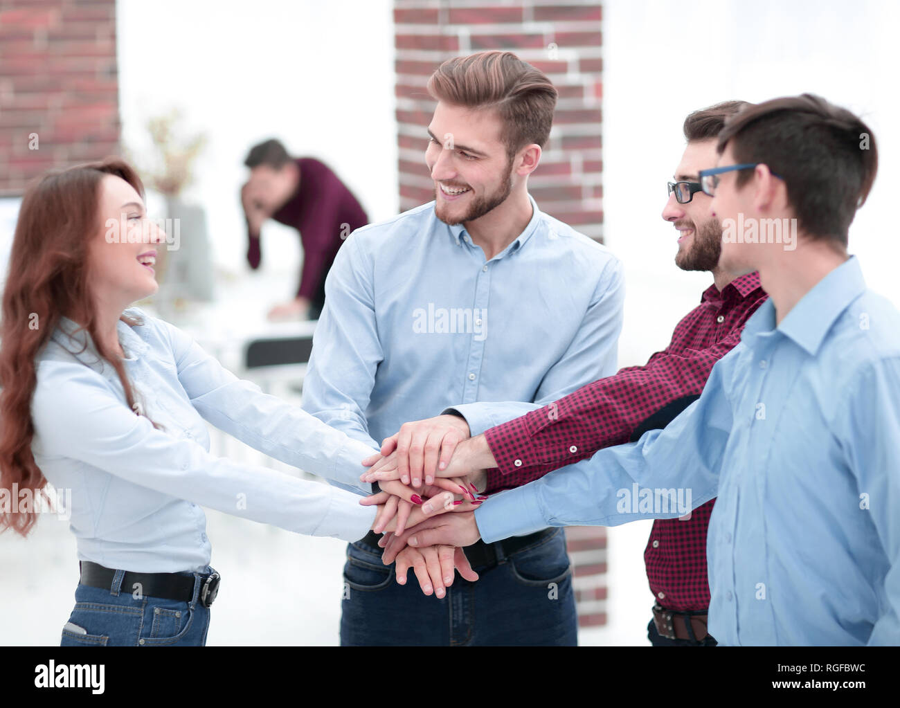 Group of people hands together partnership teamwork Stock Photo - Alamy