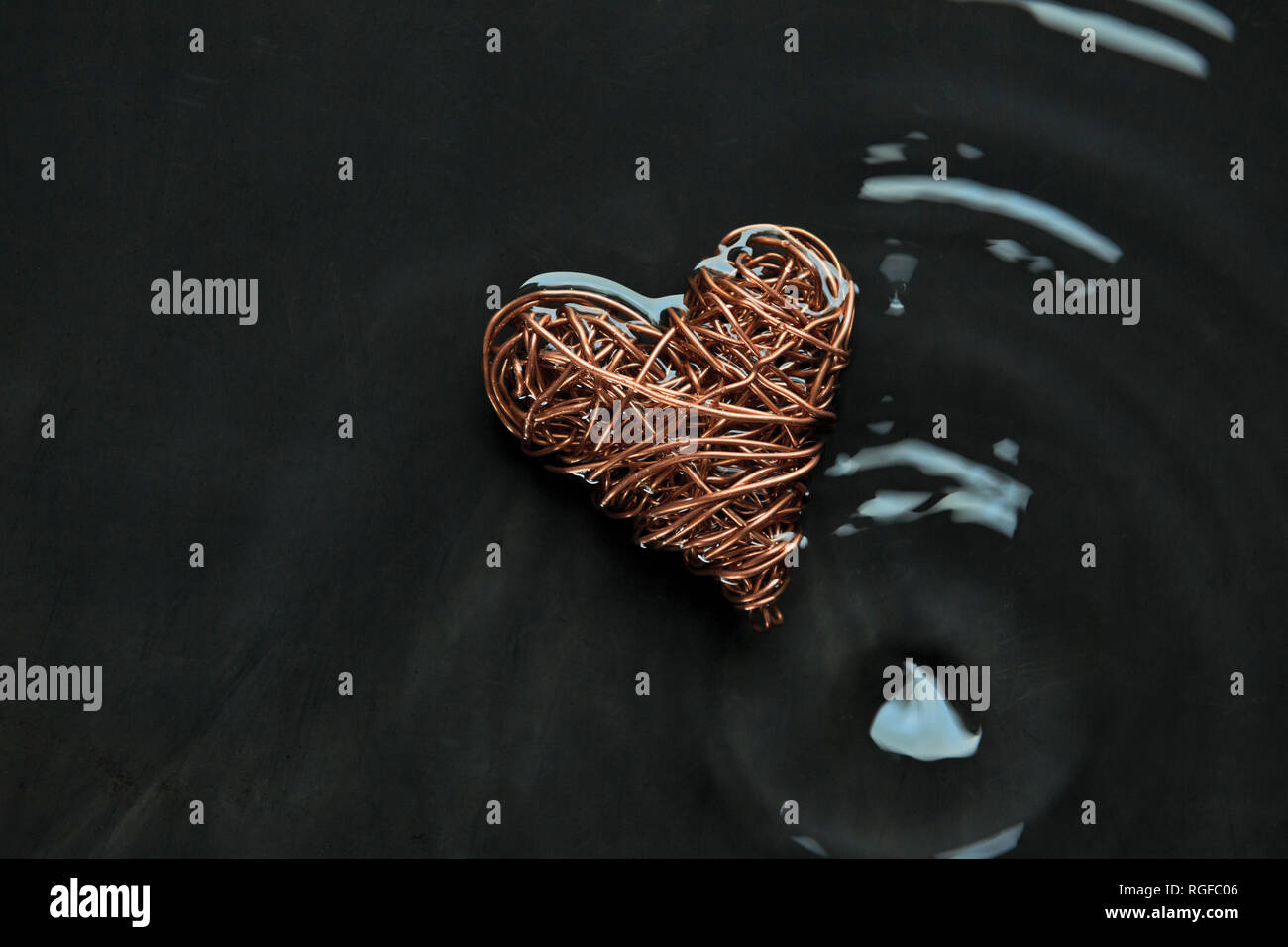 Copper wire heart made from reclaimed electric cable. Highlights on ...