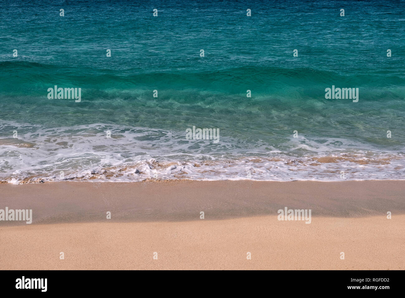 Waves at Playa de las Conchas in the north of the smallest canary ...