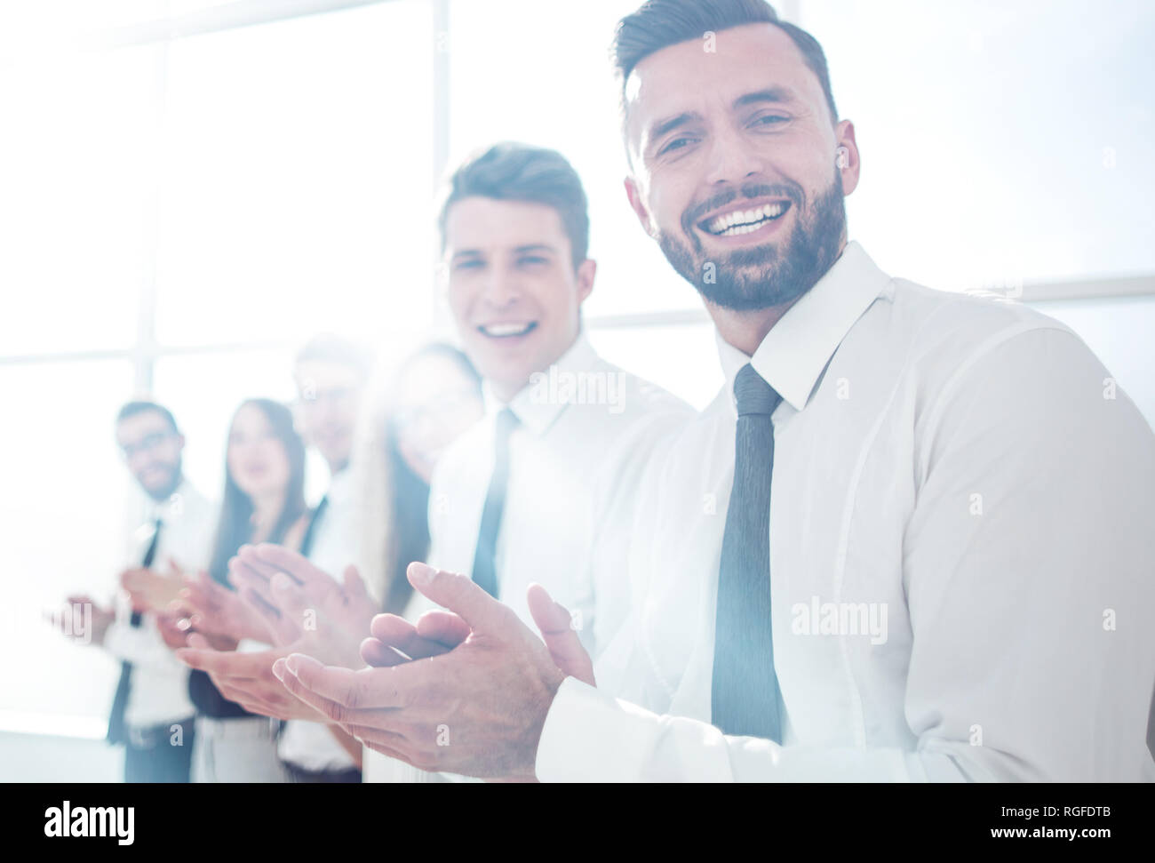 successful business people applaud standing Stock Photo - Alamy