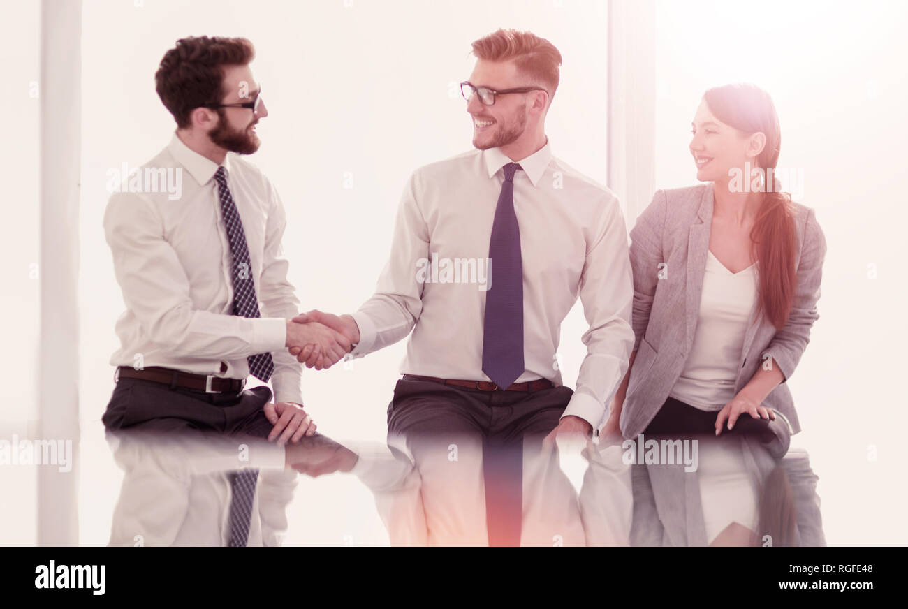 business background. business handshake in the new office Stock Photo ...