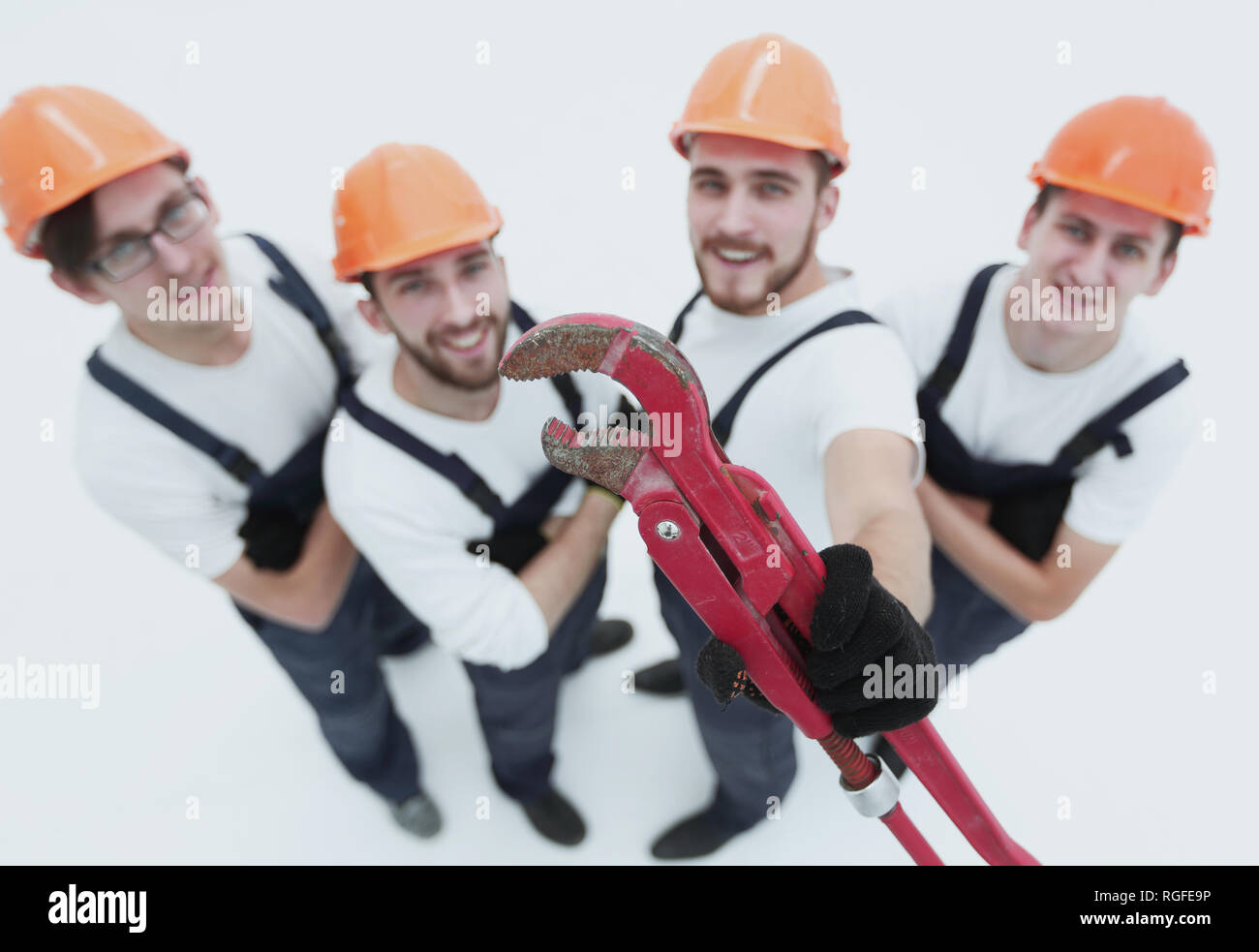view from the top.the team of plumbers showing gas keys Stock Photo - Alamy