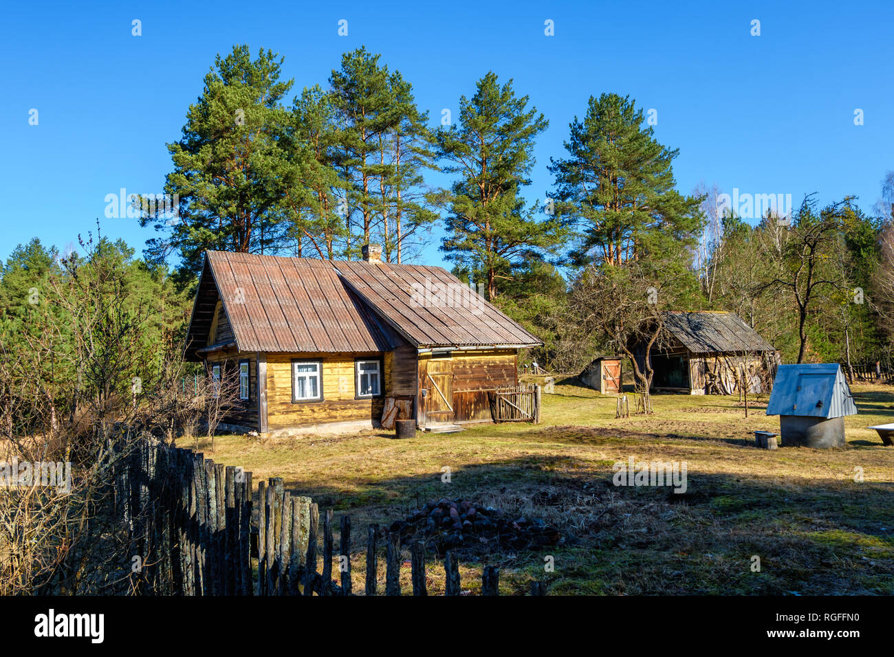 old wooden country house in the Russian outback village at dawn in the ...